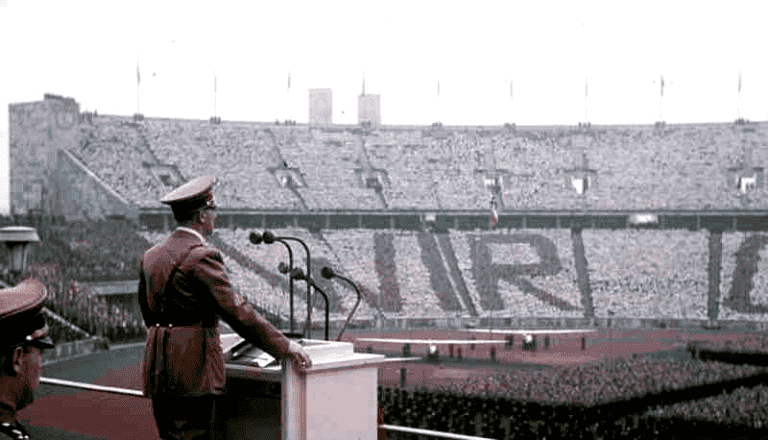 A-rare-color-photograph-of-Hitler-speaking-to-an-Olympic-croud.